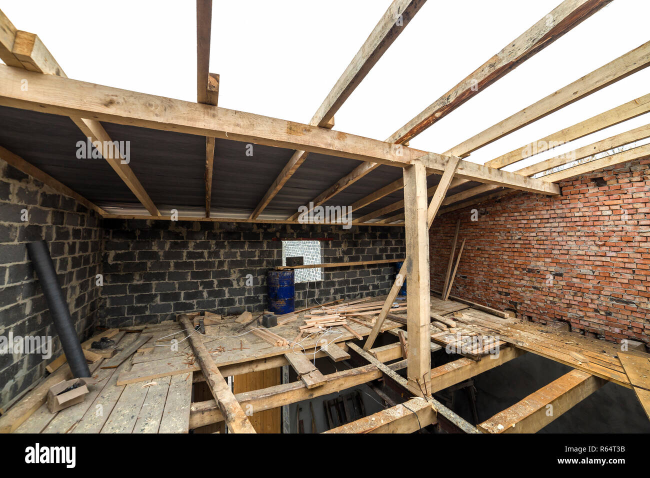 Two-storied building under construction and renovation. Perspective ...