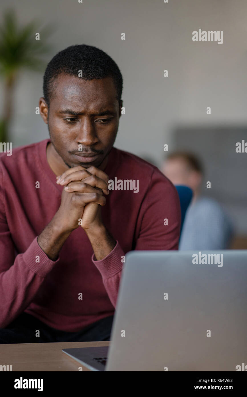 Close-up Of Person Typing On Laptop At startup office Stock Photo - Alamy