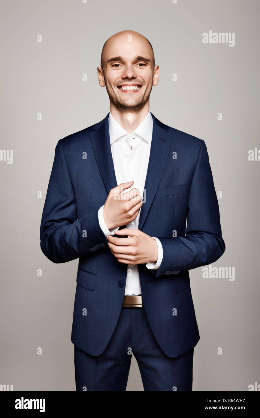 Man Fixing Cufflinks his Suit Stock Photo - Alamy