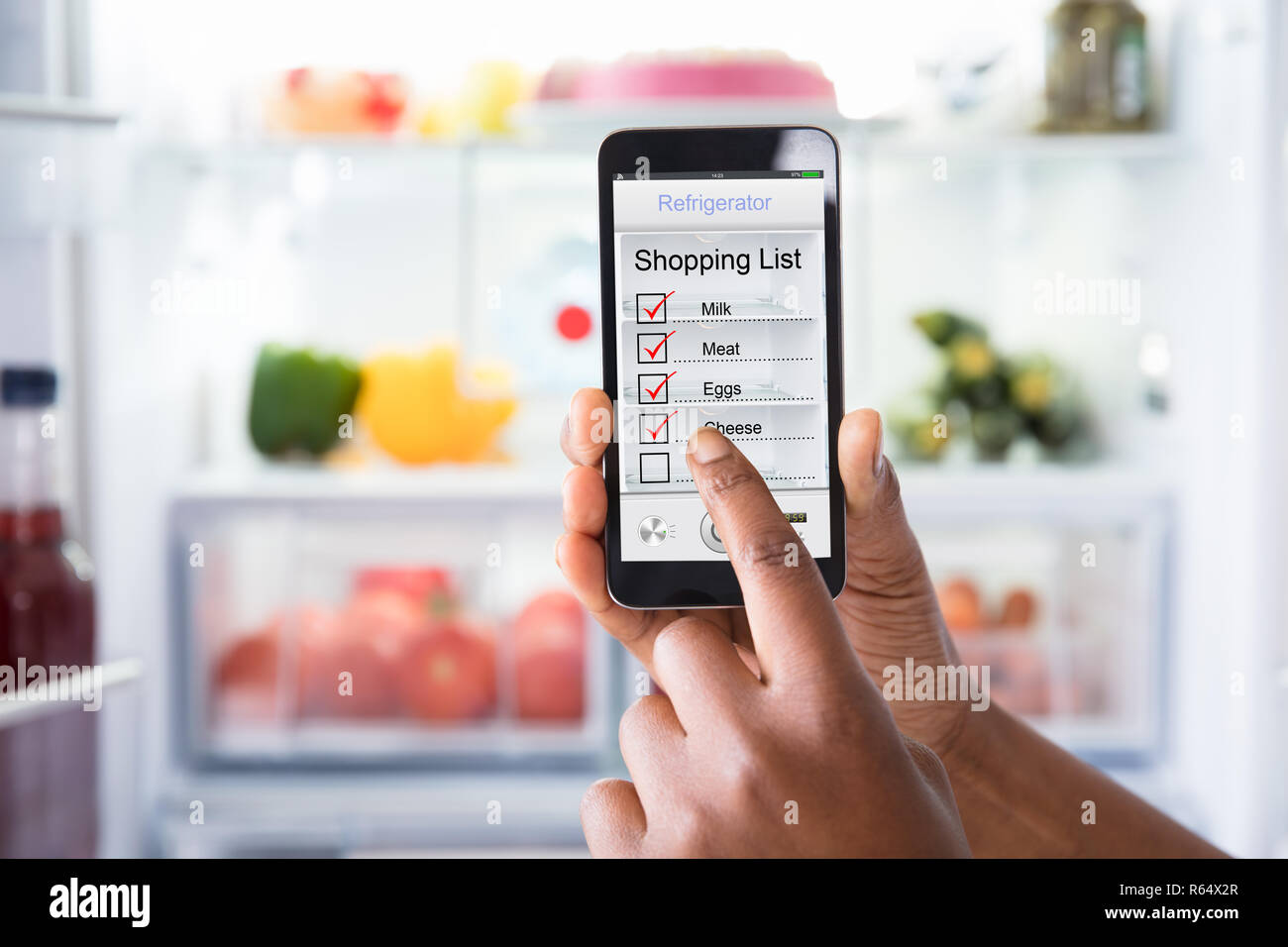Human Hand Marking Shopping List On Mobile Phone Stock Photo - Alamy
