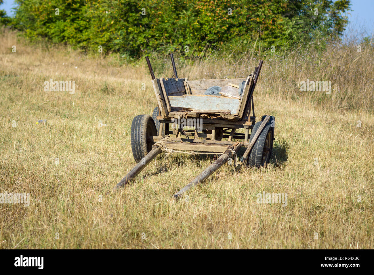 An old cart in the field Stock Photo - Alamy