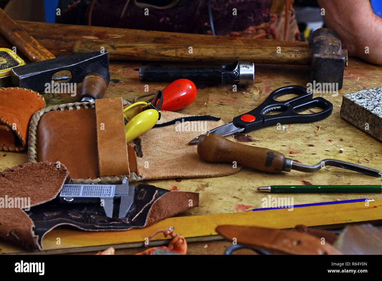 Leathercraft working tools on workshop desk Stock Photo - Alamy
