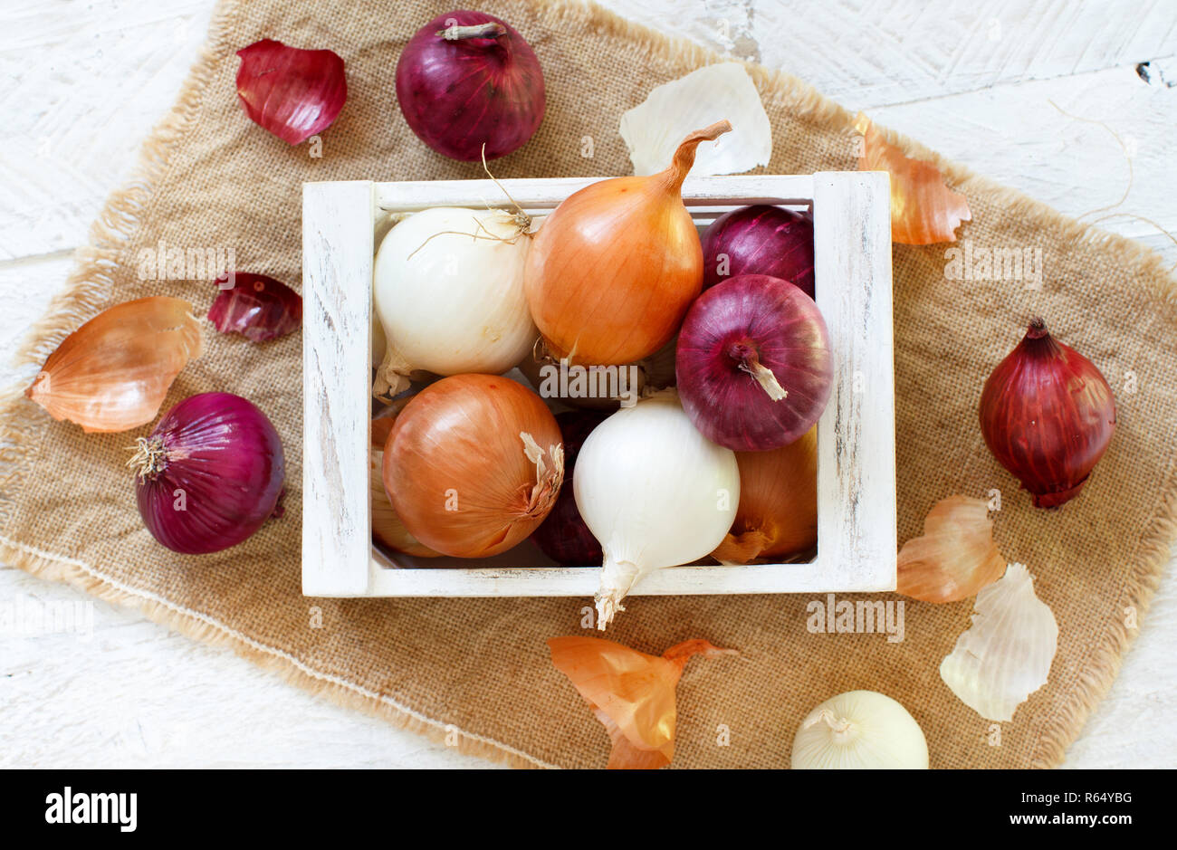 Raw onions in box Stock Photo - Alamy