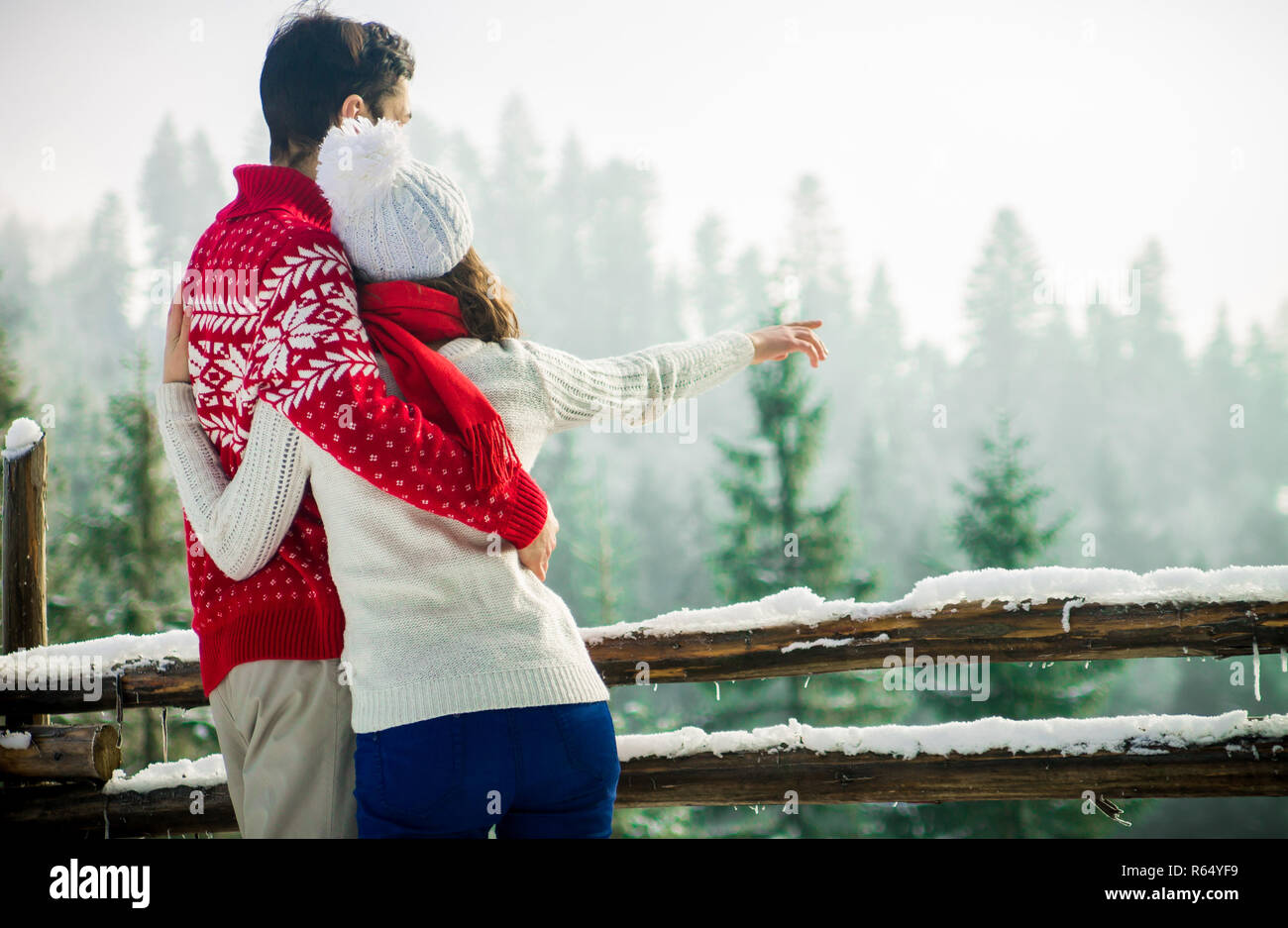 Happy couple hugging on the Capathians forest background Stock Photo ...