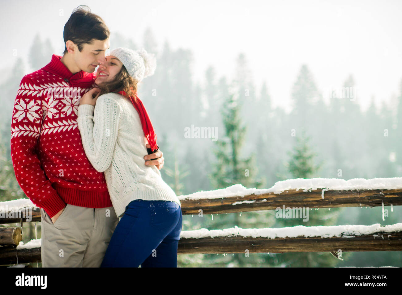Happy couple hugging on the Capathians forest background Stock Photo ...