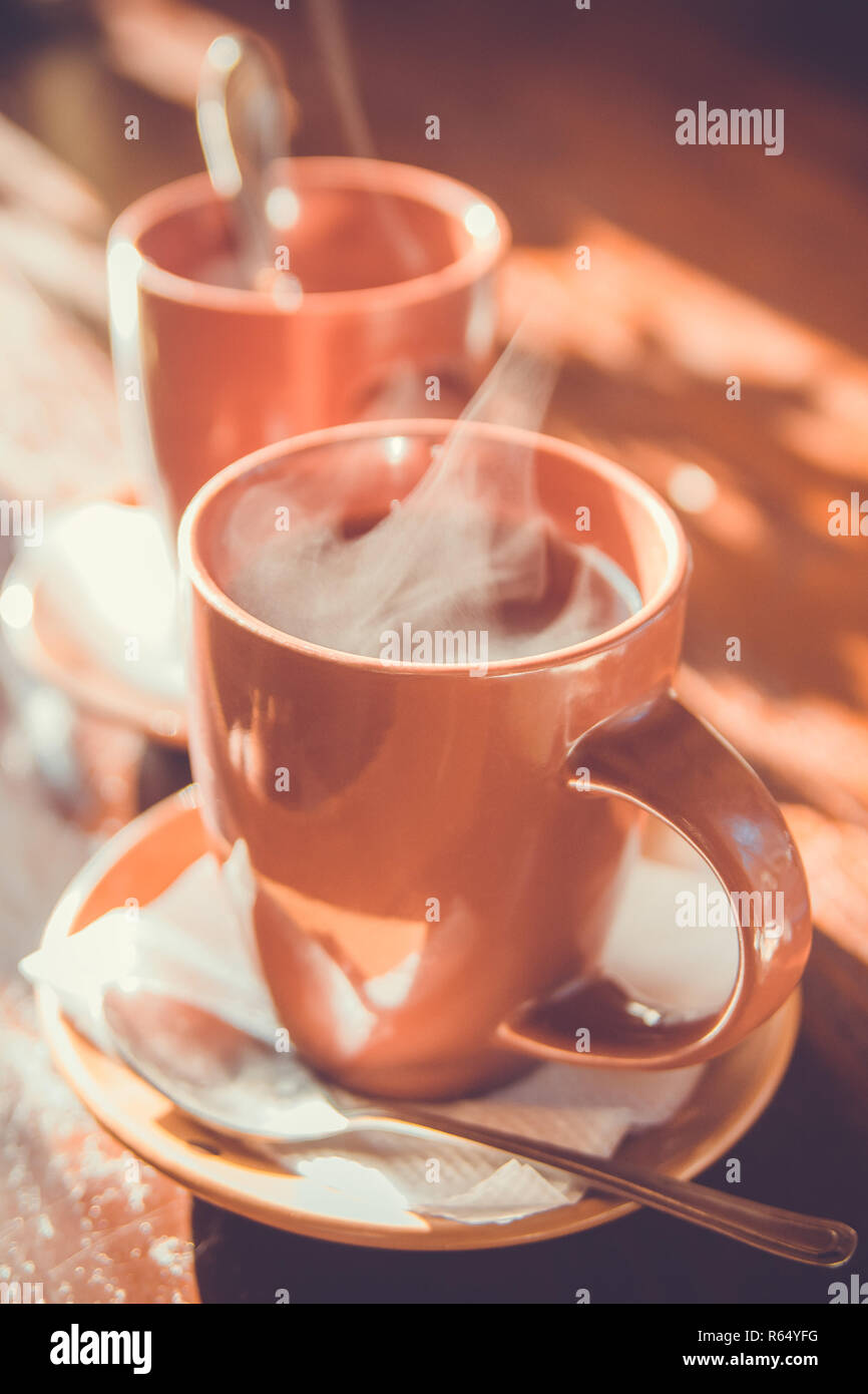 Two steaming coffee cups hi-res stock photography and images - Alamy