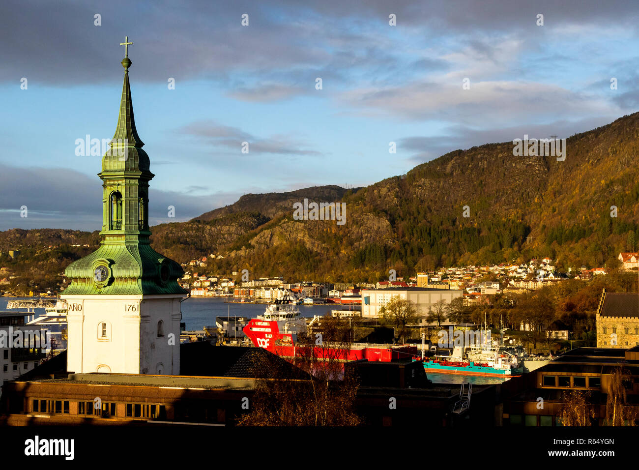 Autumn in Bergen, Norway. Church spire of the Nykirken church (built ...