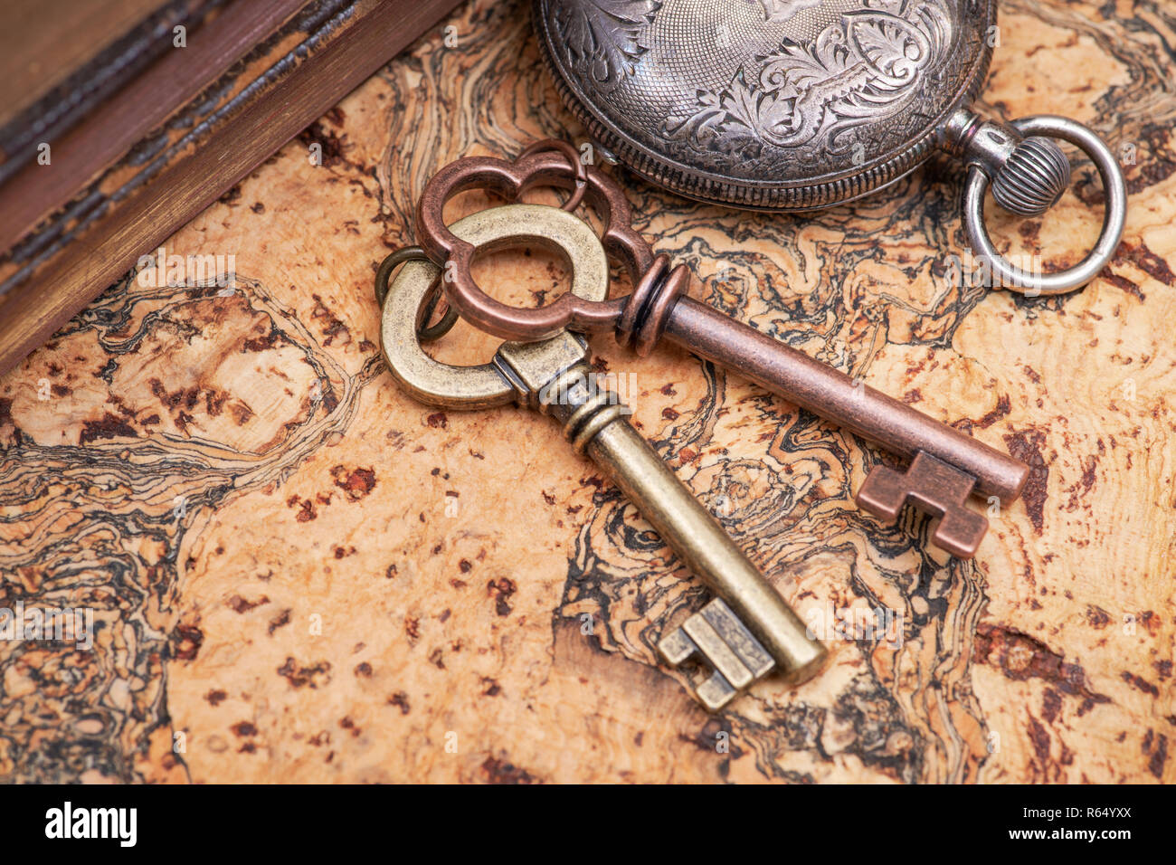 Panta rhei concept: Antique pocket watch, vintage keys and pile of old ...