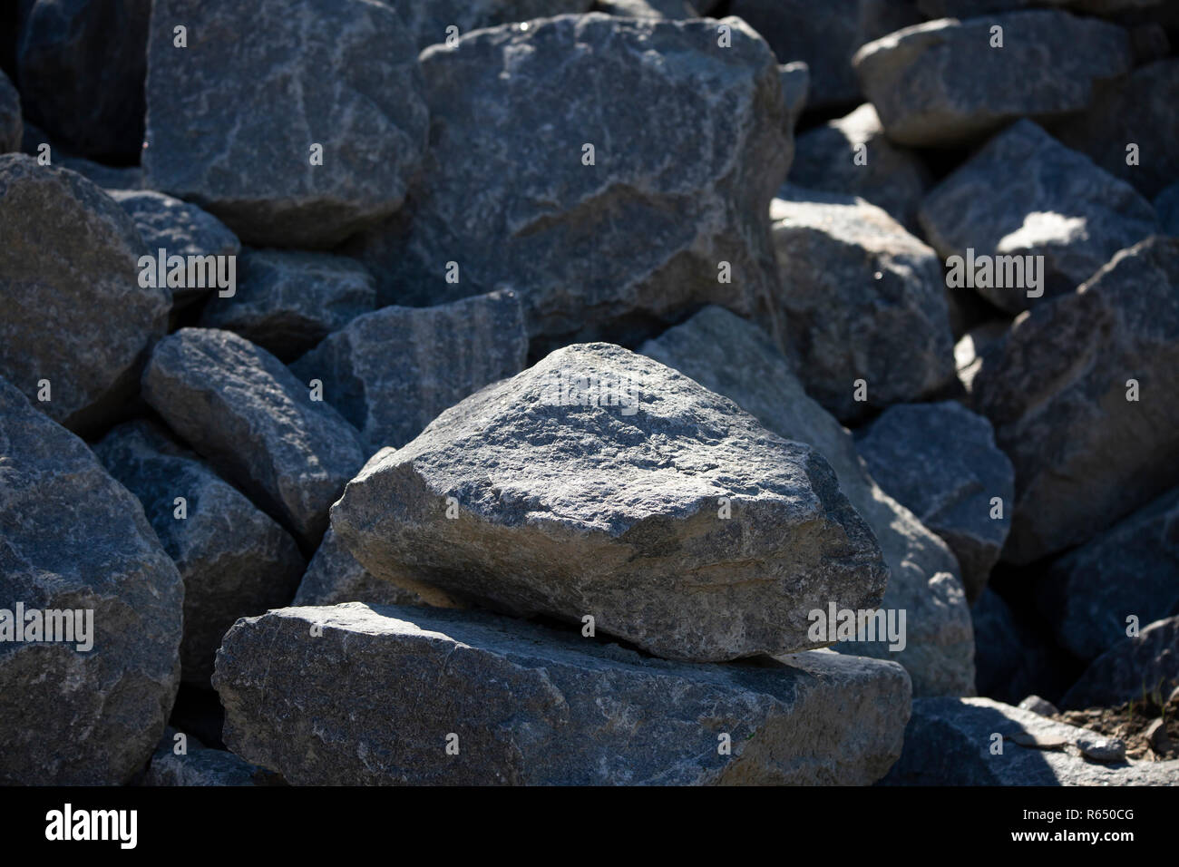 Close up of large, sparkly grey granite rocks Stock Photo - Alamy