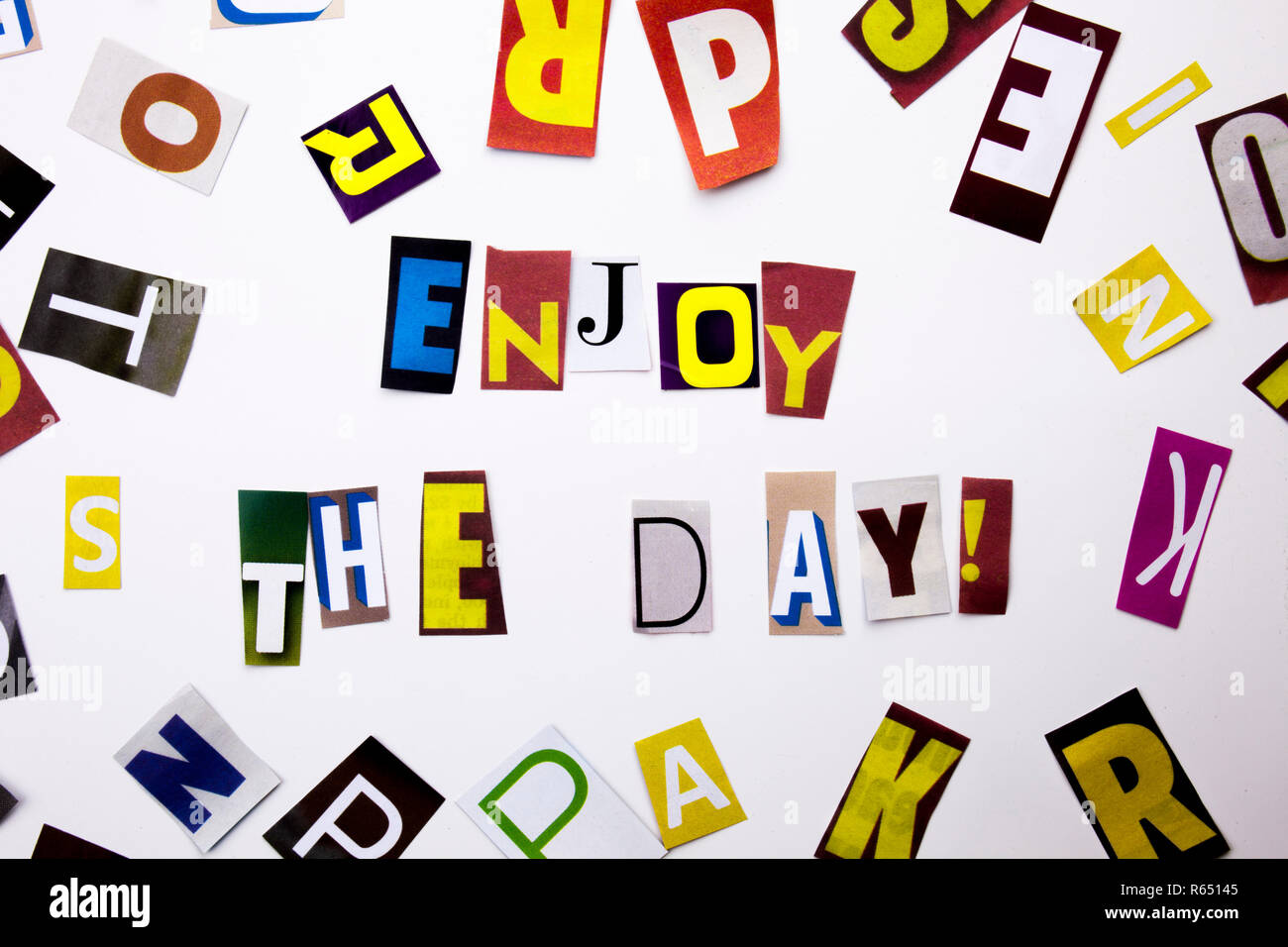 A word writing text showing concept of Enjoy The Day made of different ...