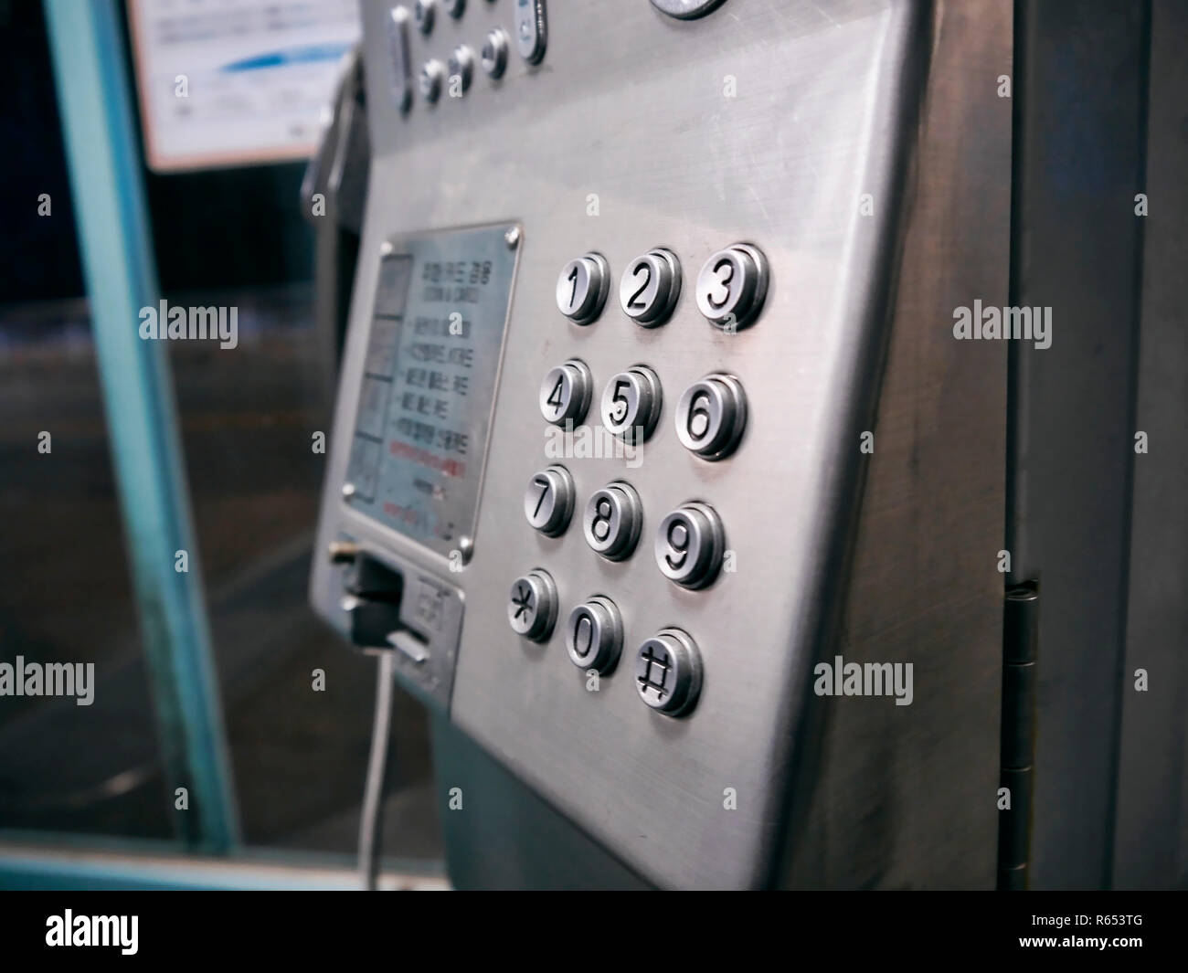 Buttons on the telephone booth in the phone booth Stock Photo - Alamy