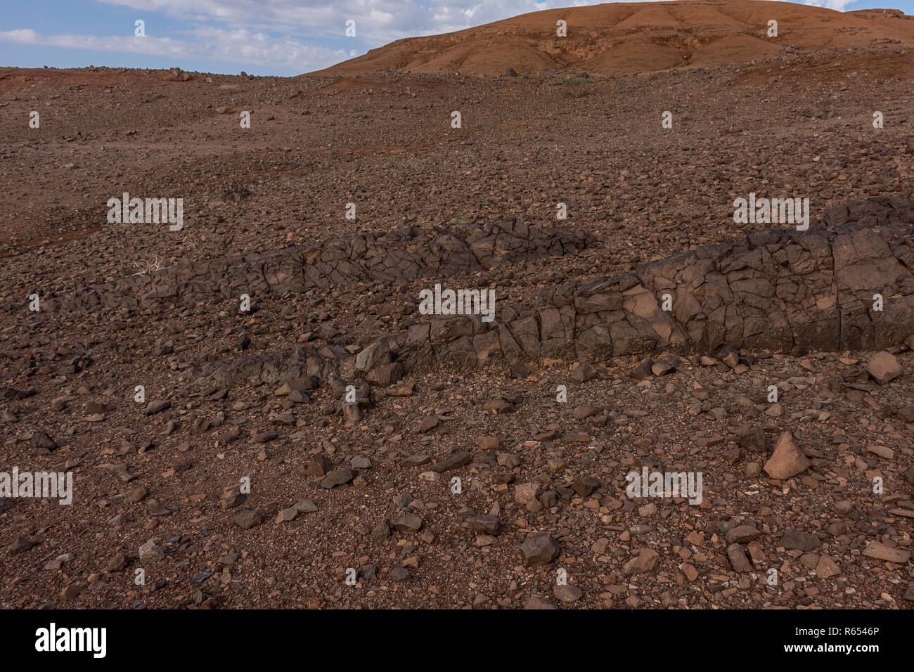 Lava outcrops on the slope of the Al Wahbah volcanic crater, Saudi ...