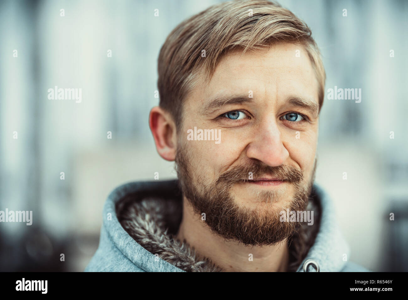 Portrait of a young bearded man Stock Photo - Alamy