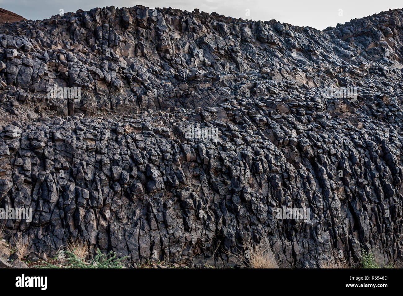 Lava outcrops on the slope of the Al Wahbah volcanic crater, Saudi ...