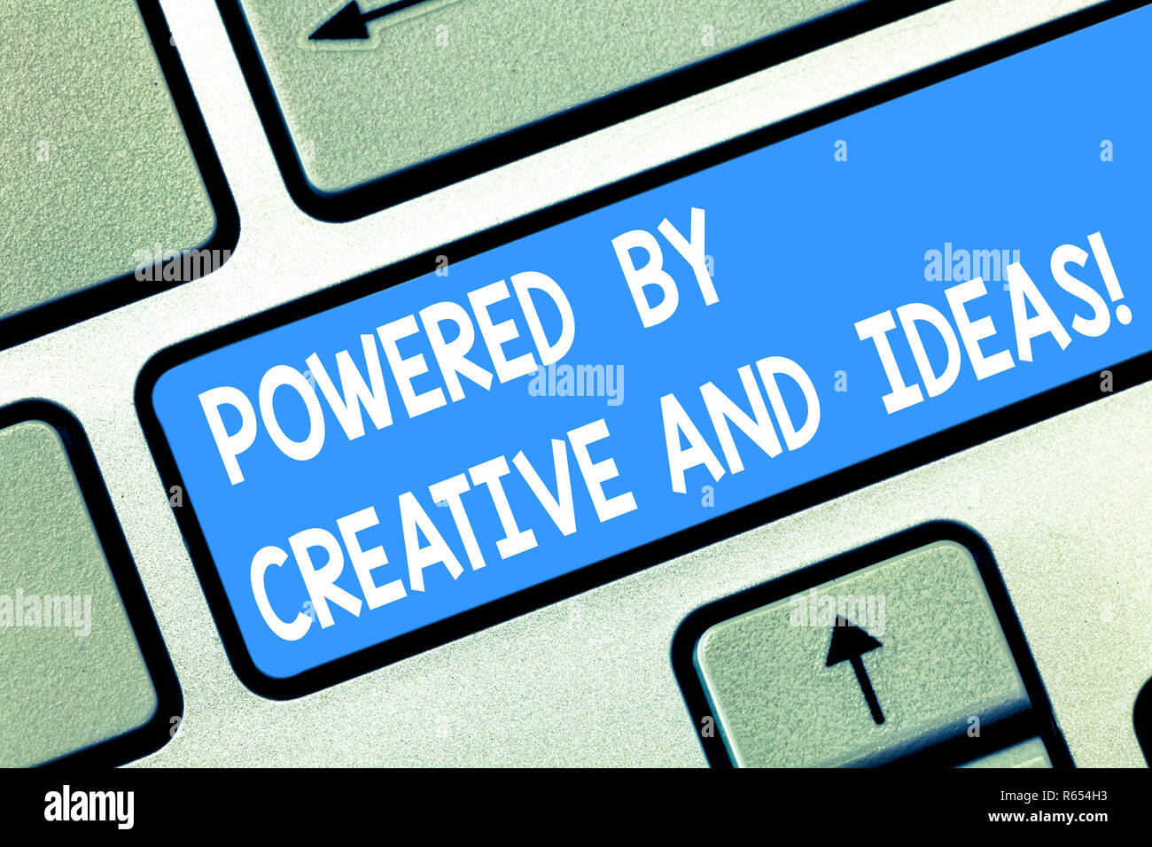 Handwriting text Powered By Creative And Ideas. Concept meaning ...