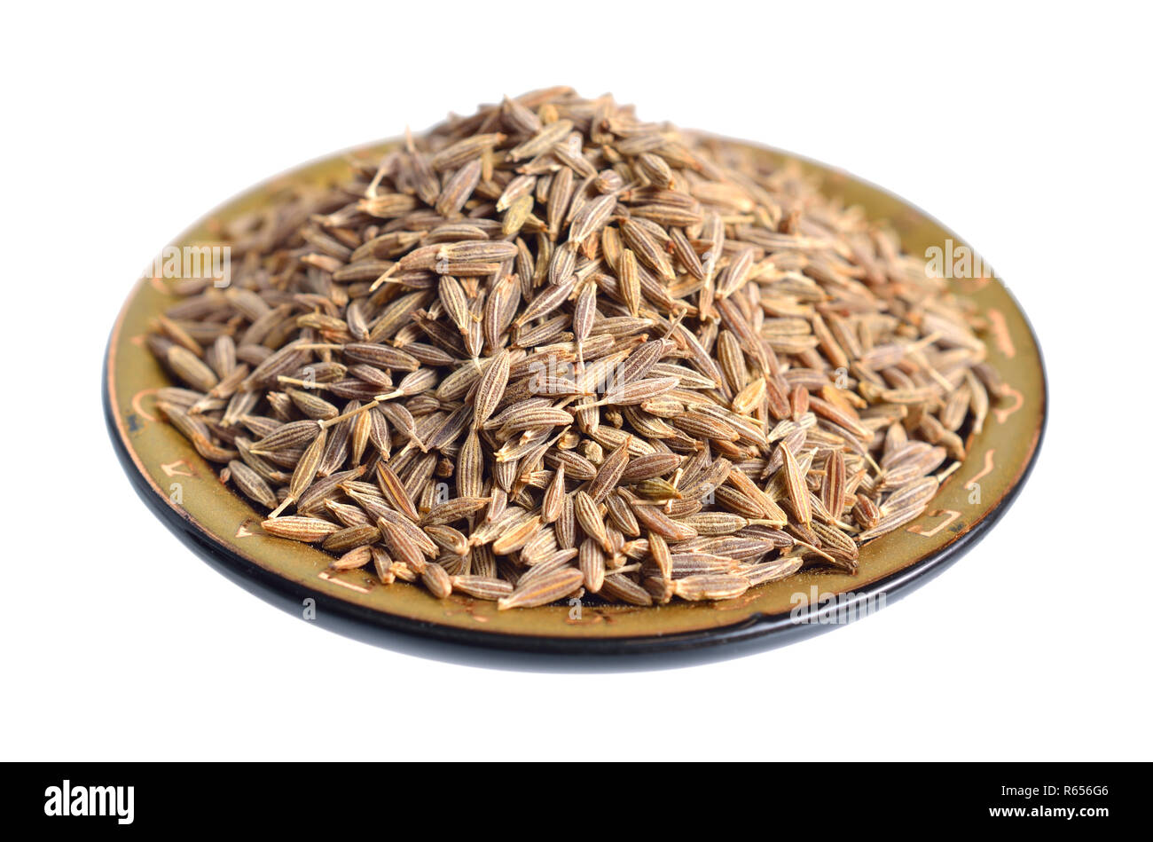 Cumin or zira seed. Isolated on white background Stock Photo - Alamy