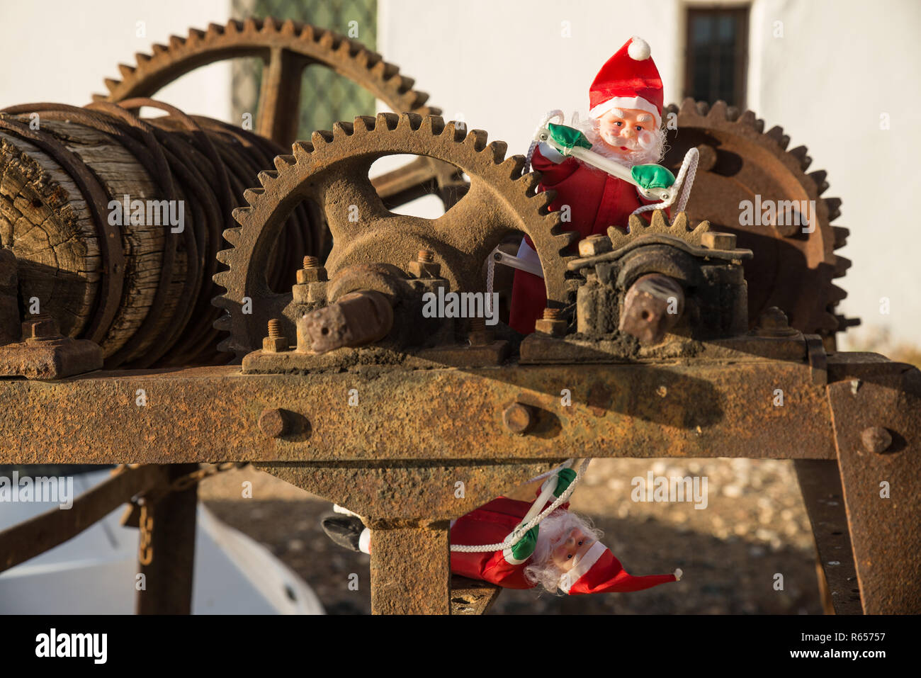 Santa in the cogwheels of consumerism, a concept Stock Photo - Alamy