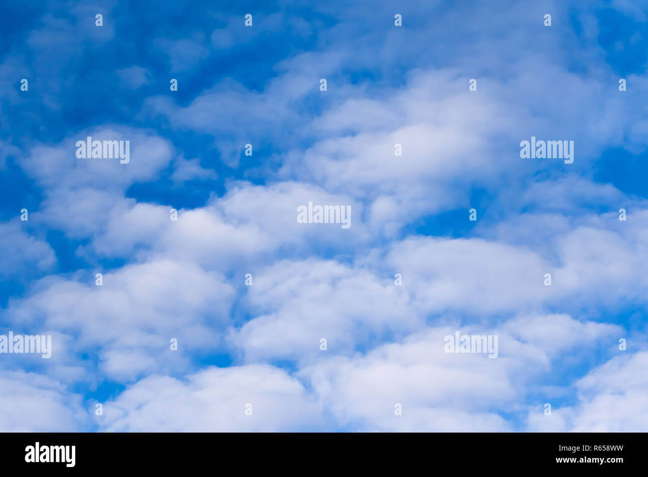 Blue sky with white clouds Stock Photo - Alamy