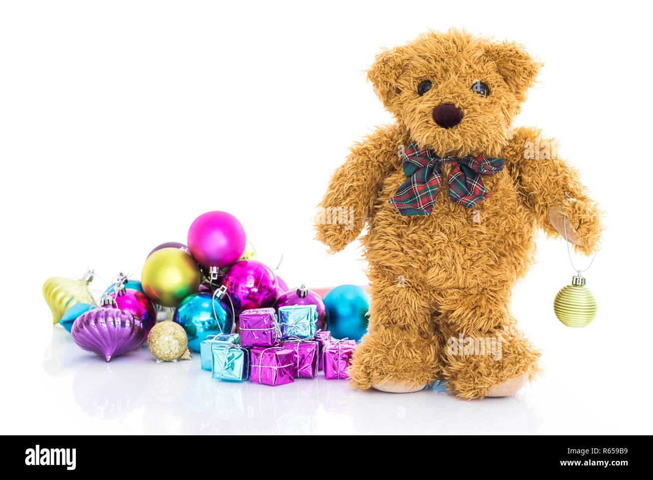 Teddy bear with gifts and ornaments christmas Stock Photo - Alamy