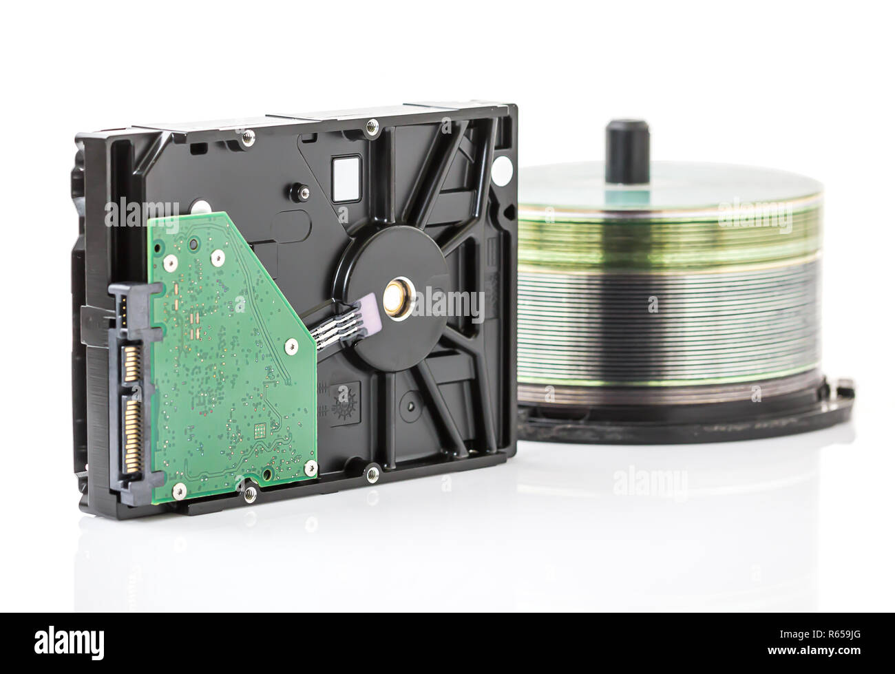 Hard disk drive and dvd discs Stock Photo - Alamy