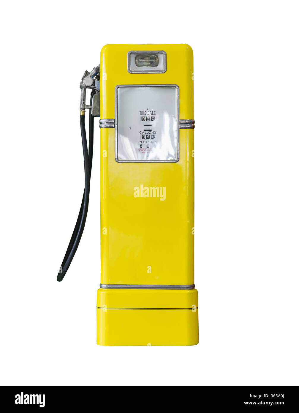 Vintage yellow fuel pump on white Stock Photo - Alamy