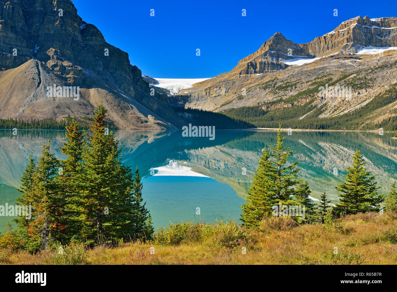 Bow glacier reflected in Bow Lake, Banff National Park, Alberta, Canada ...