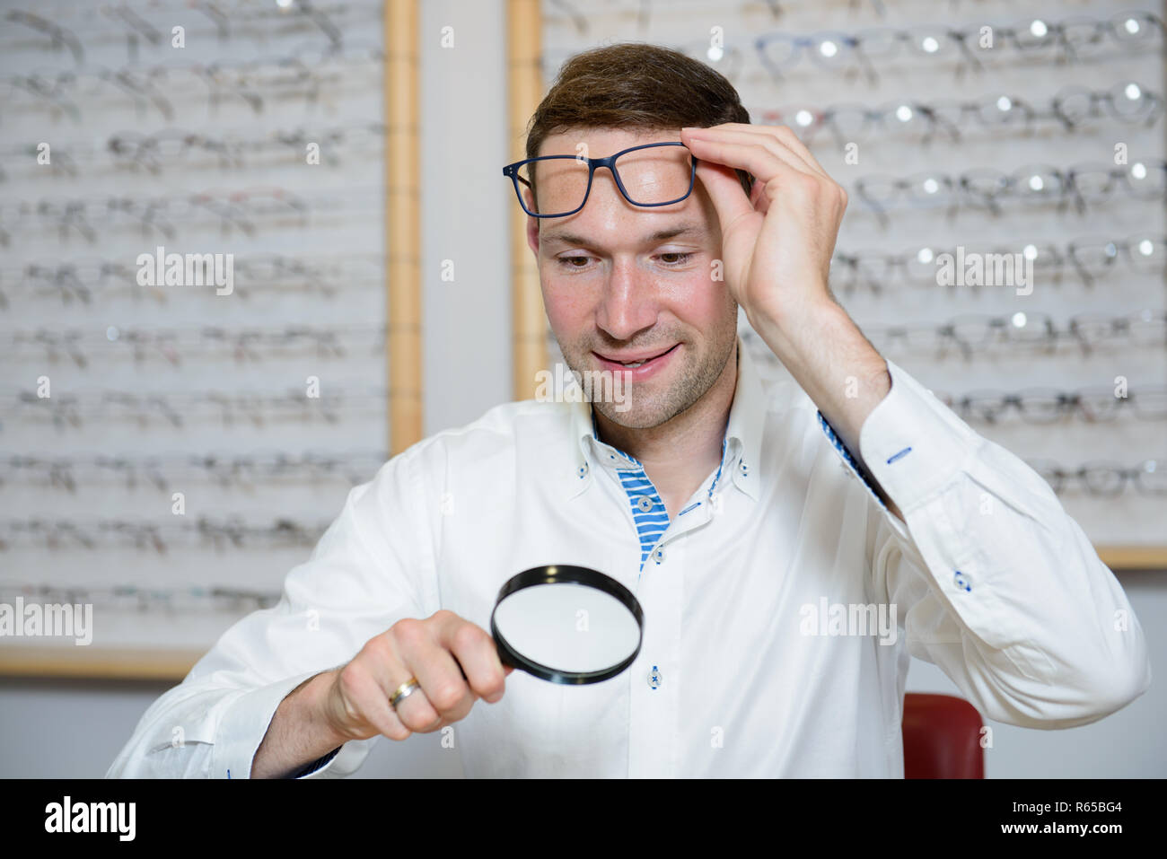 Young patient wearing trial frame hi-res stock photography and images ...