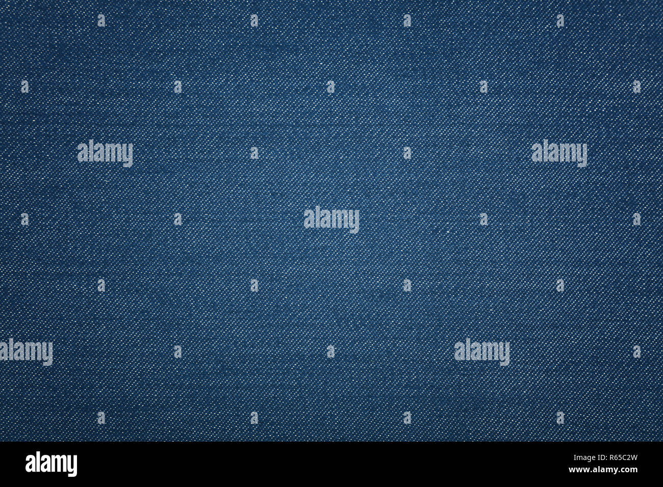 Blue washed jeans denim texture background Stock Photo - Alamy