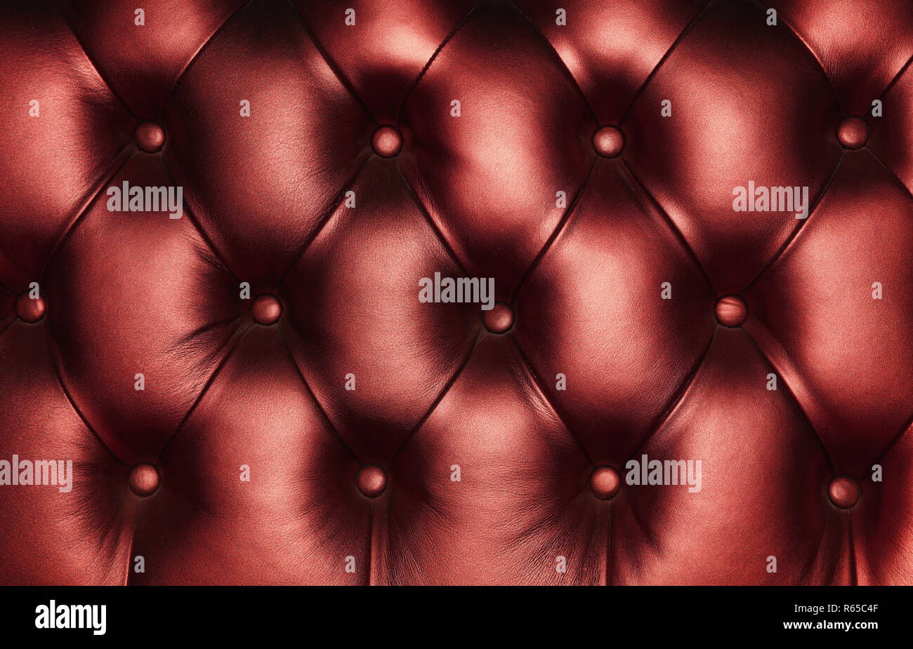 Dark red leather capitone background texture Stock Photo - Alamy