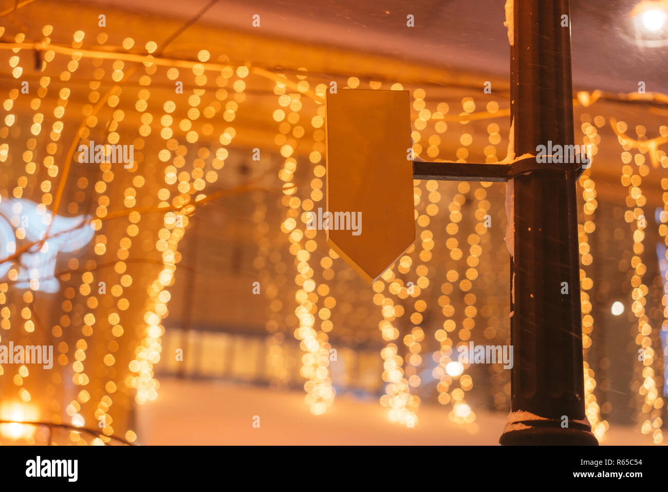 Electric garland and house Stock Photo - Alamy