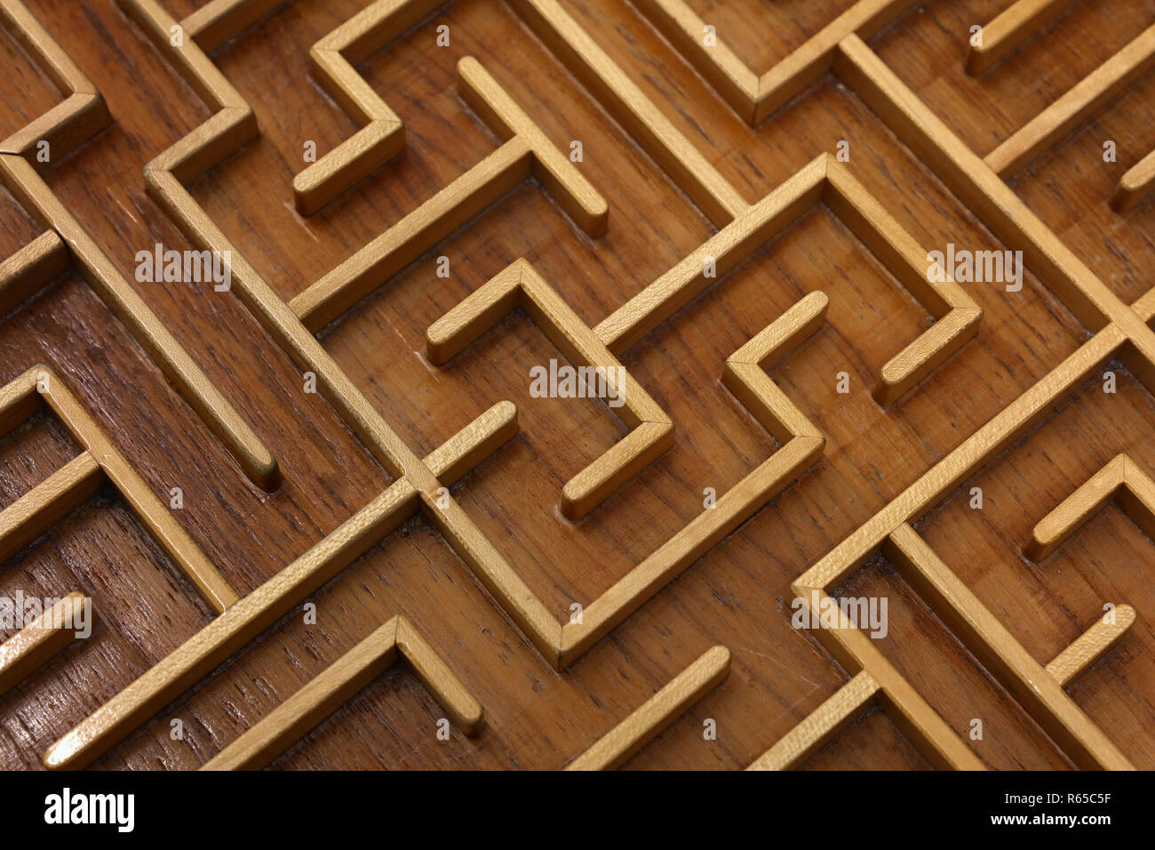 Wooden labyrinth maze puzzle close up Stock Photo - Alamy
