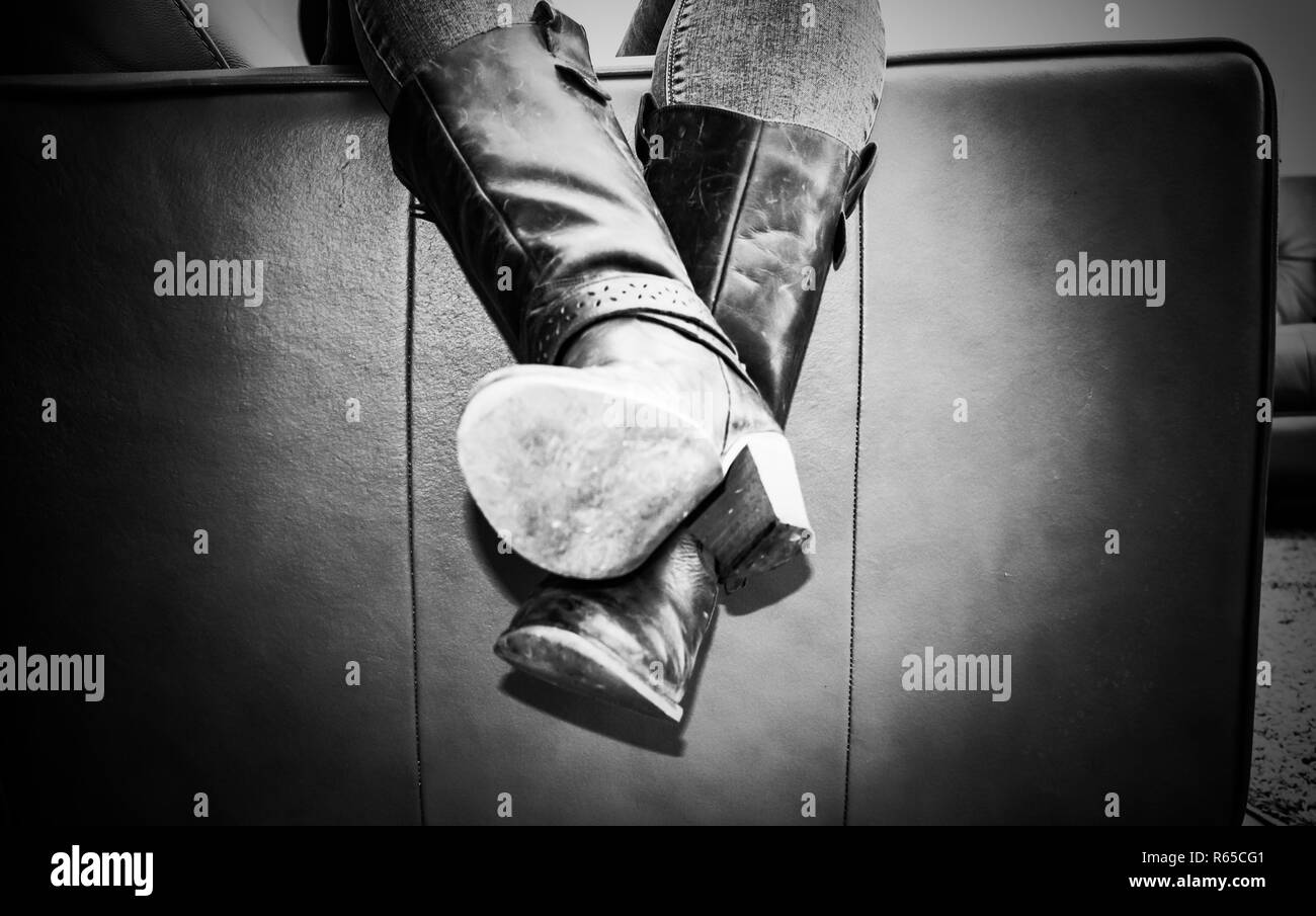 Tired Old Boots Stock Photo - Alamy