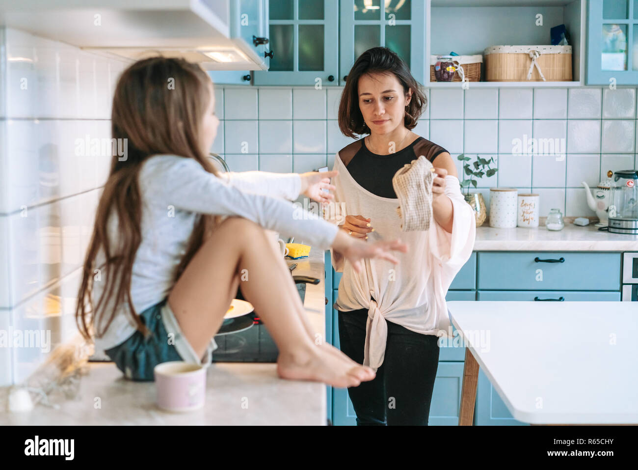 happy family cook together in the kitchen Stock Photo - Alamy