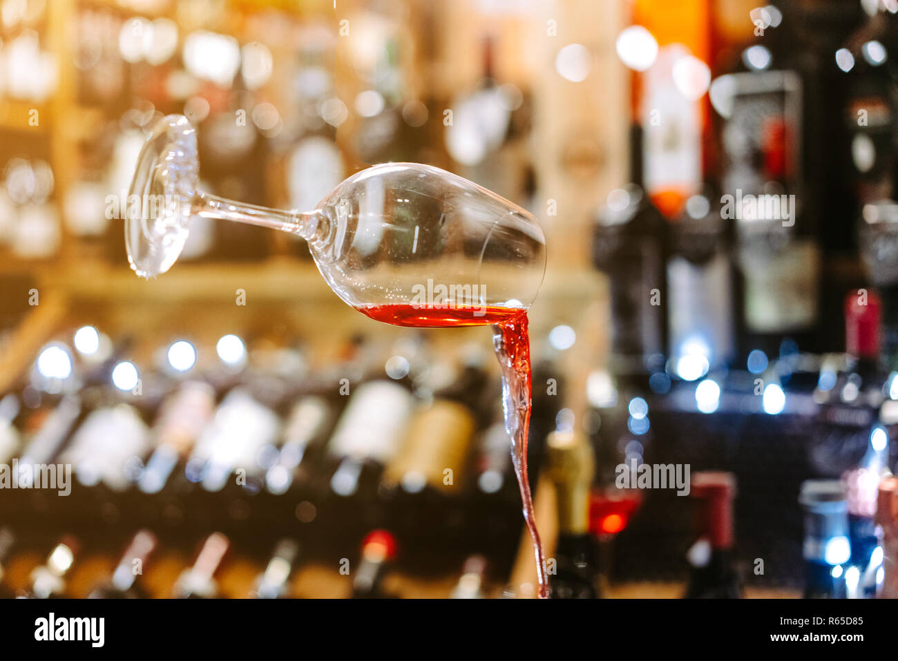 Glass of Wine Falling Mid Air with Spill Stock Photo - Alamy