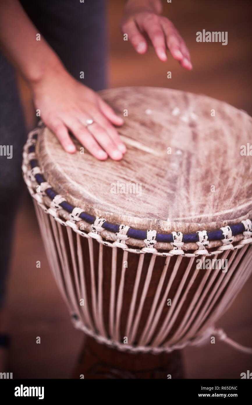Hand tapping bongo drum hi-res stock photography and images - Alamy