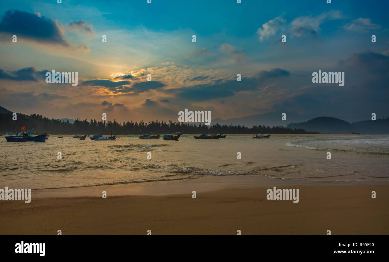 A coastline scene at sunset looking out over the south China sea in ...