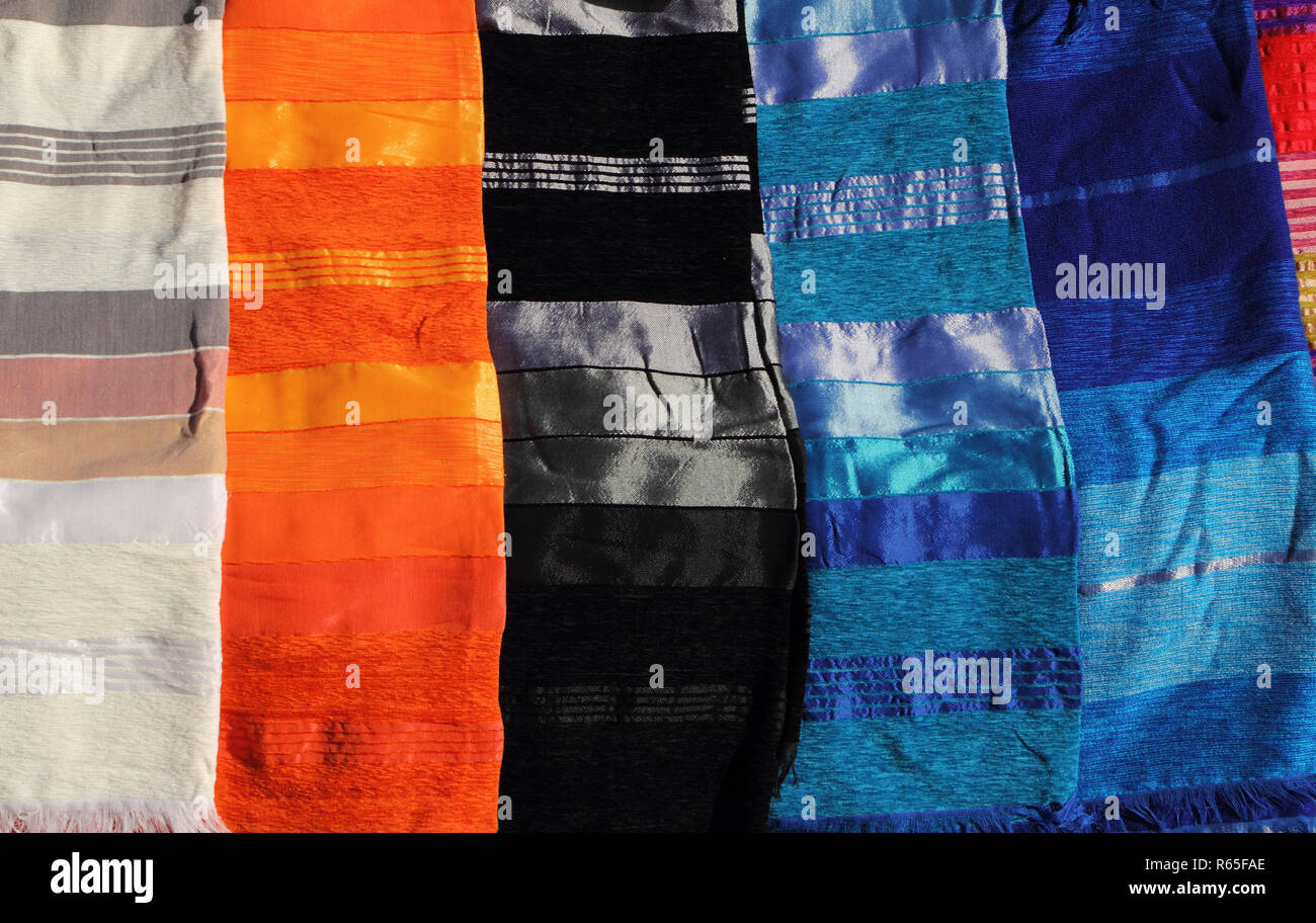 Morocco. Typical colourful hand crafted silk cloth covers on display in ...