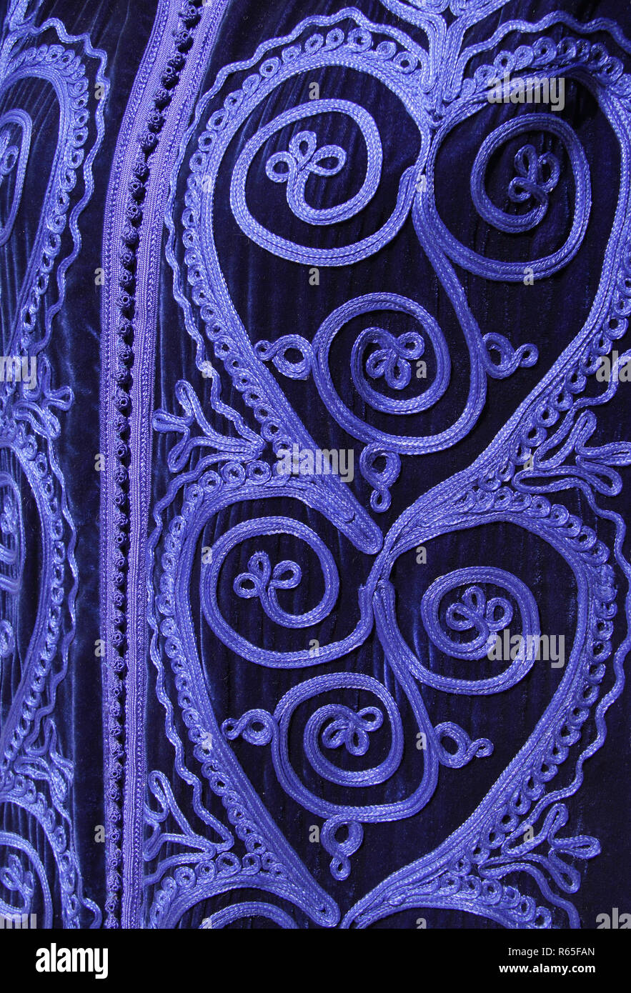 Morocco Detail of a woman's Berber blue intricately embroidered wool ...