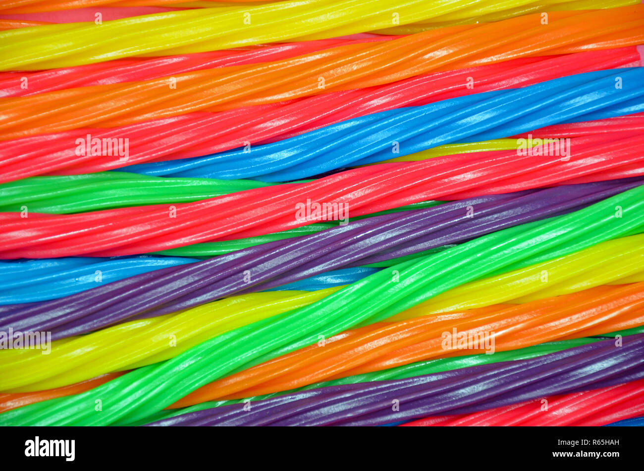 Rainbow colored licorice candy Stock Photo - Alamy
