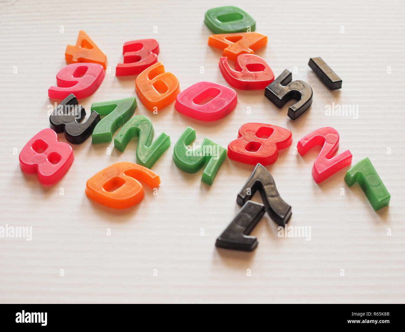 Plastic toy numbers Stock Photo - Alamy