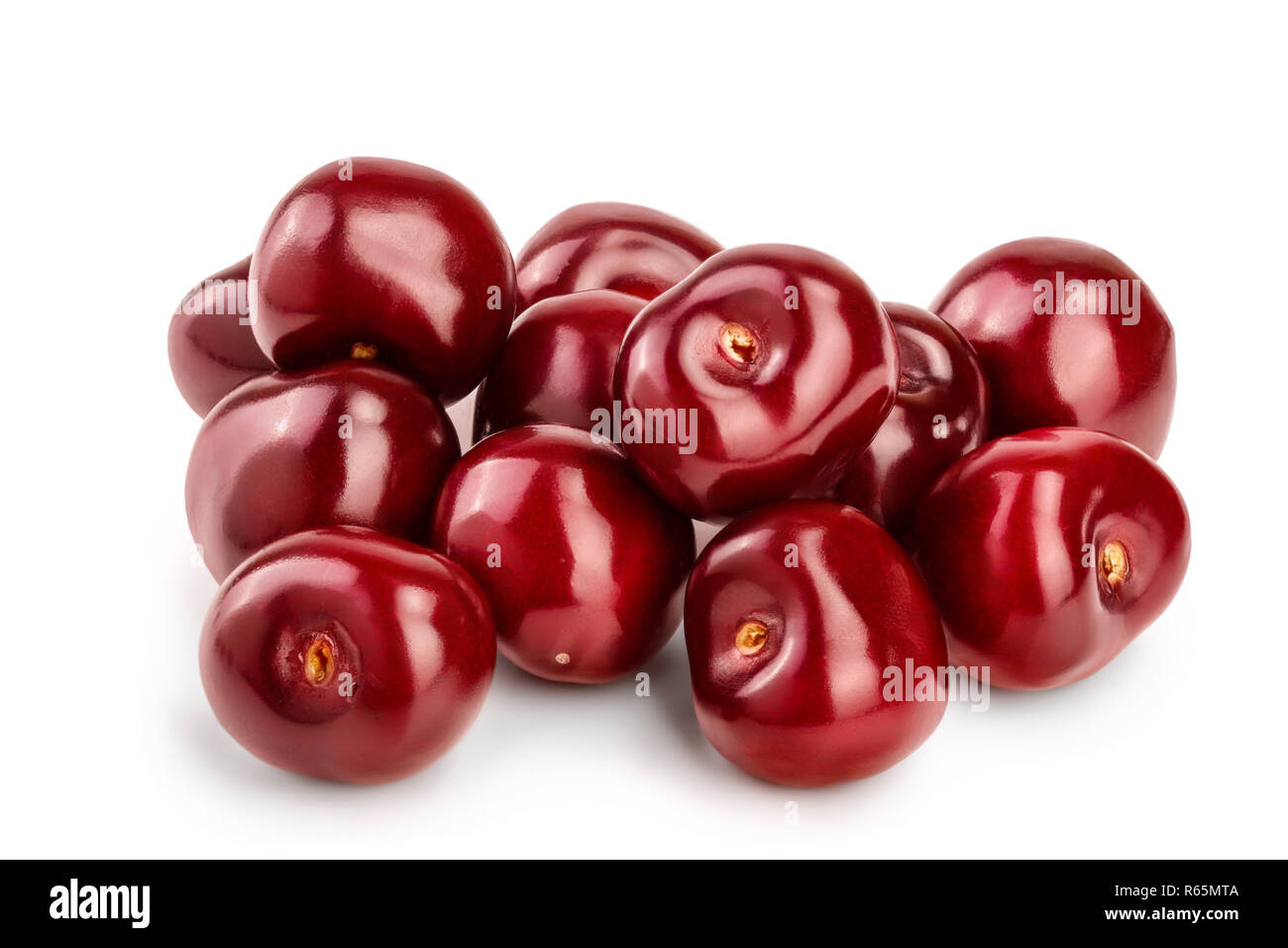 Sweet red cherries isolated on white background macro Stock Photo - Alamy