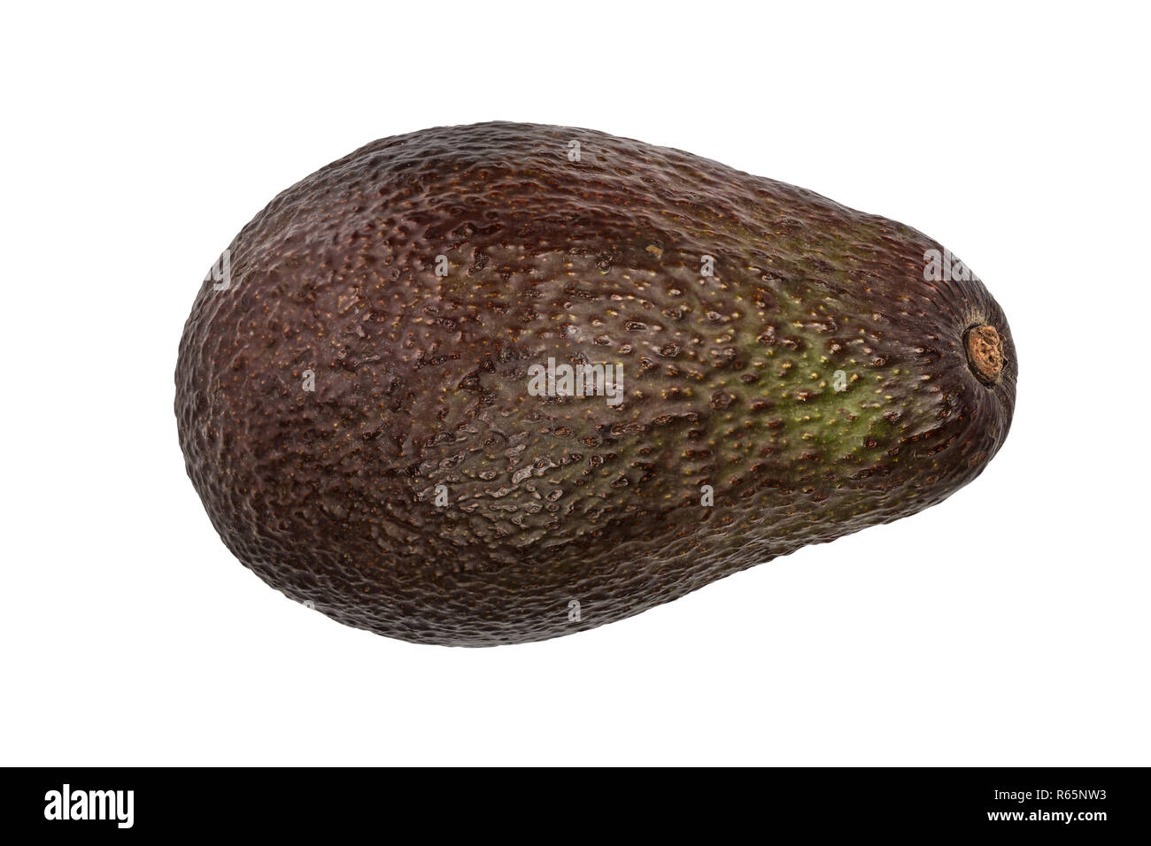 one whole avocado isolated on white background Stock Photo - Alamy