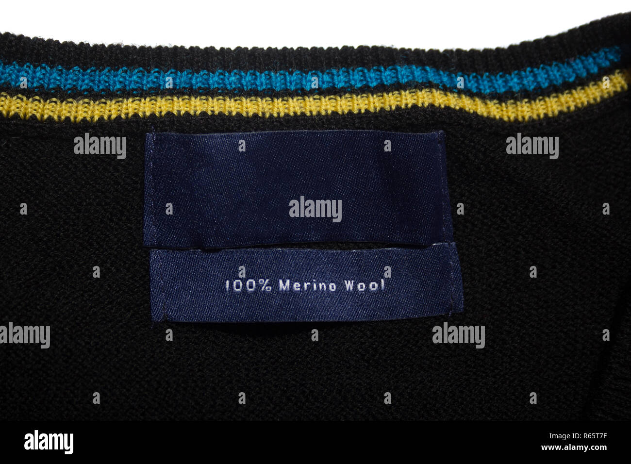 Blue Merino Wool Label on a jumper Stock Photo - Alamy