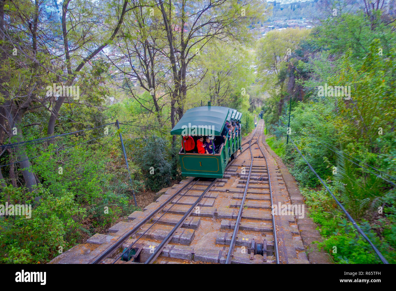SANTIAGO, CHILE - OCTOBER 16, 2018: People travel on the Funicular of ...