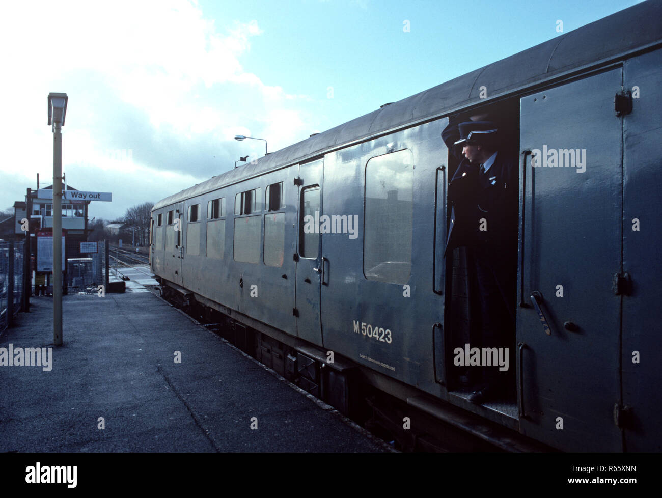 British Rail train guard on the British Rail Preston to Colne railway ...