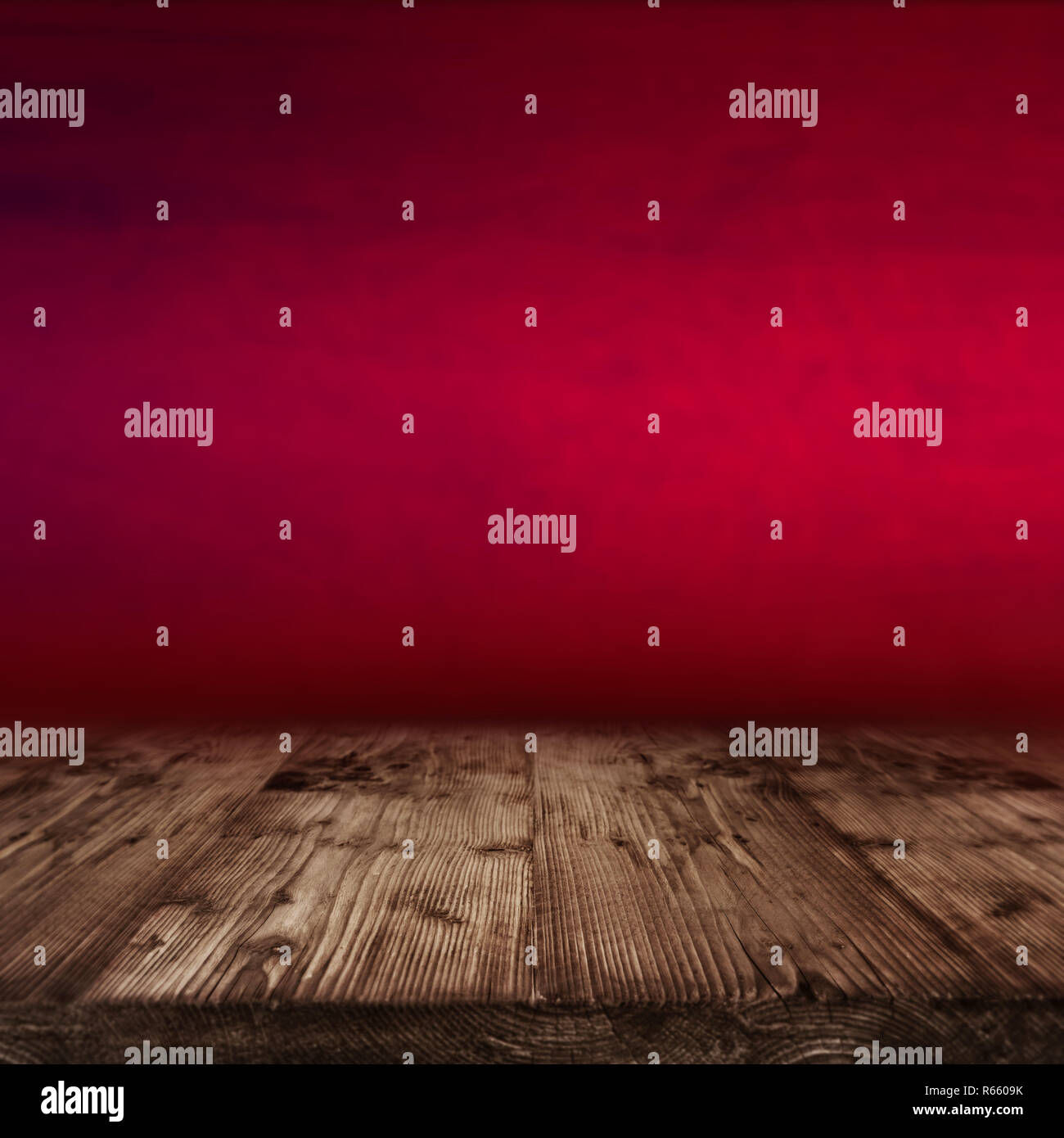 Red backdrop with wooden stage Stock Photo - Alamy