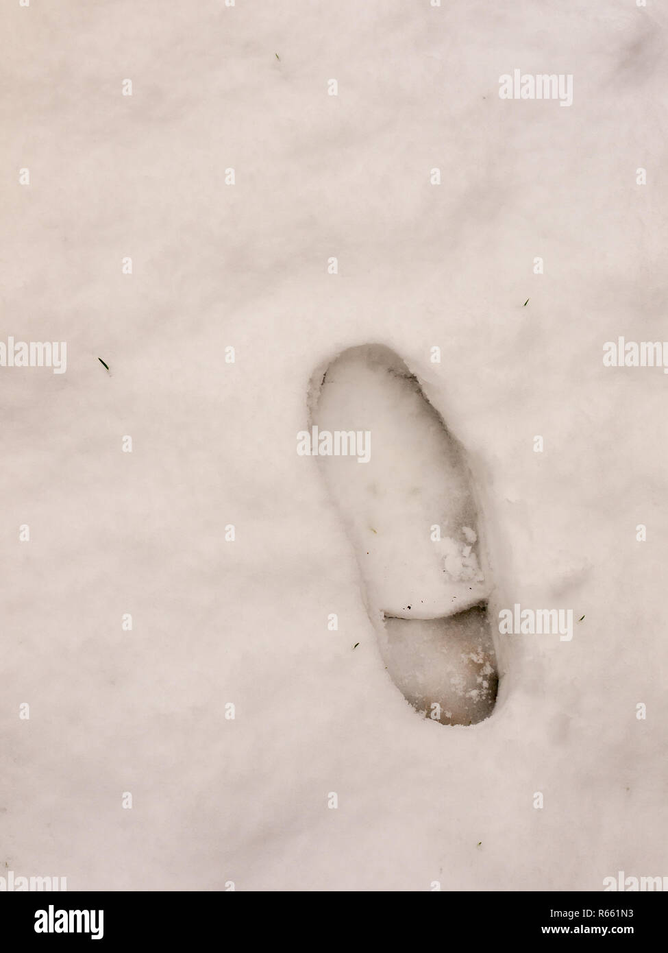 single right foot footprint in snow floor background close up Stock ...