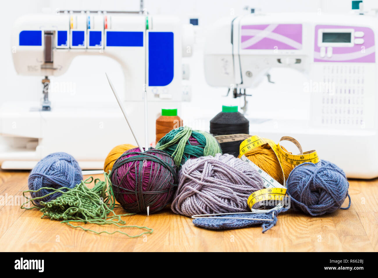 many hand knitting tools and sewing machines Stock Photo - Alamy