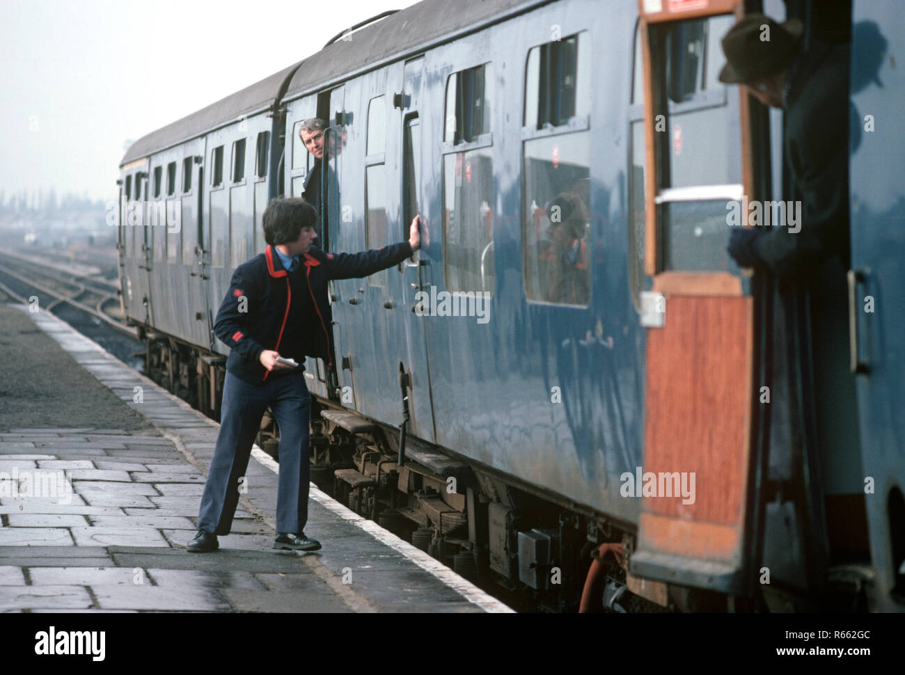 British Rail Bamber Bridge sation staff closing carriage door on Diesel ...