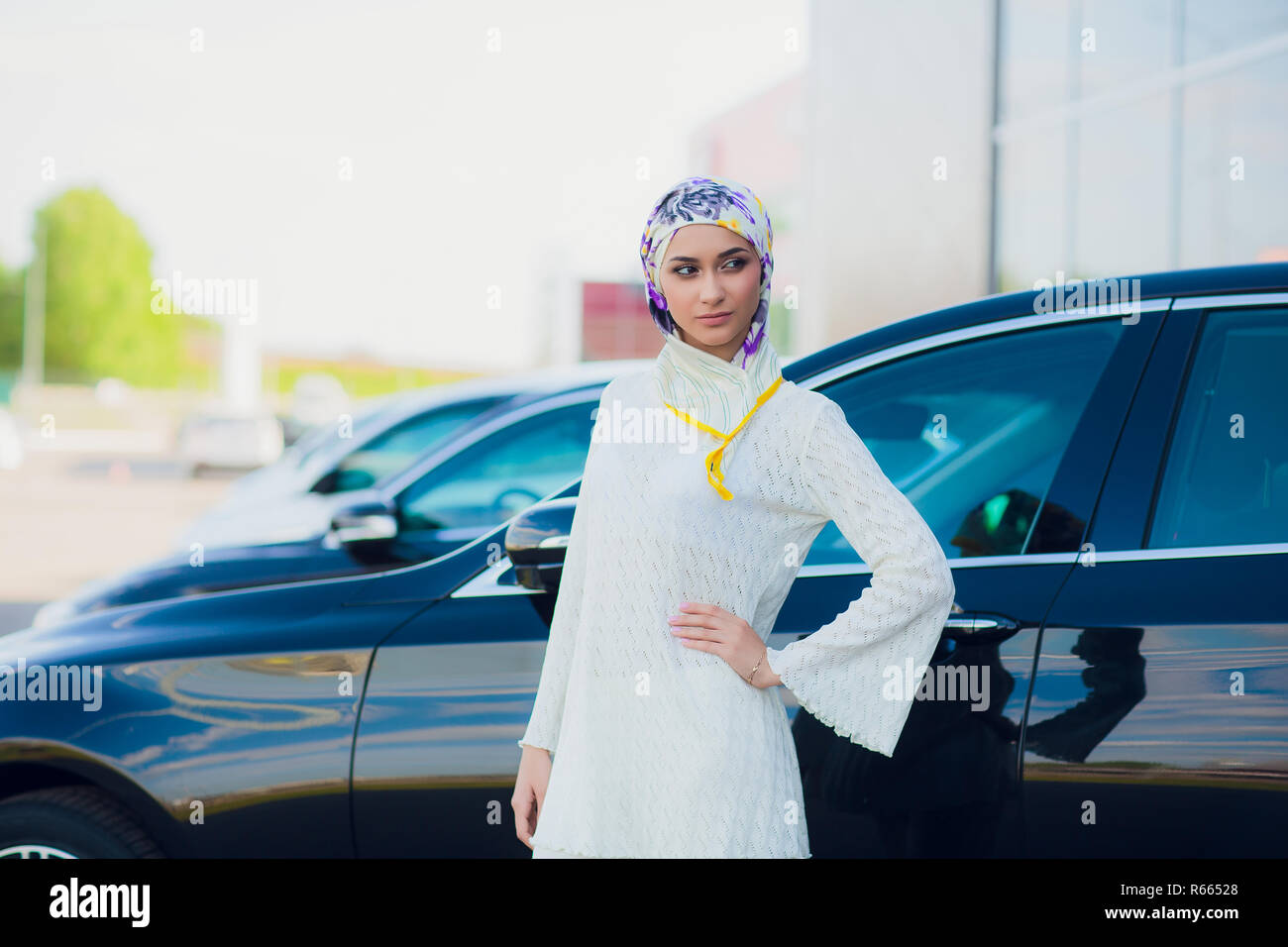 Happy muslim woman standing Stock Photo - Alamy
